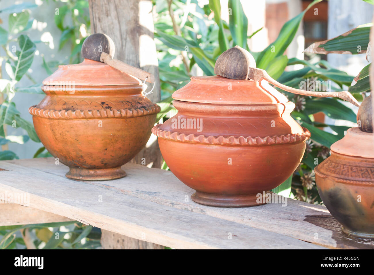 Clay pot filled with water Stock Photo - Alamy