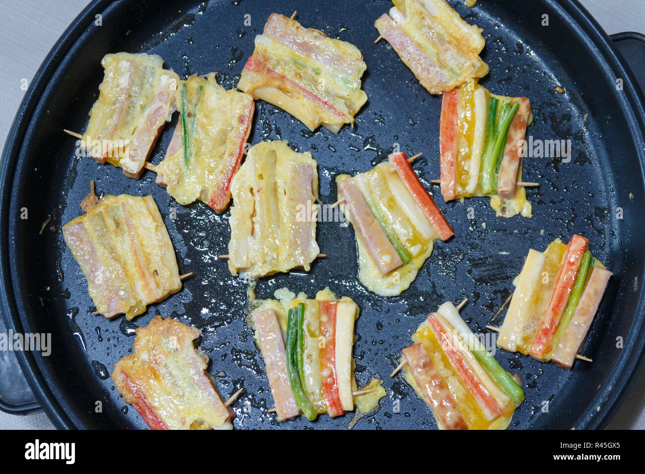 Korean traditional food Sanjeok, made by placing seasoned slices of ...