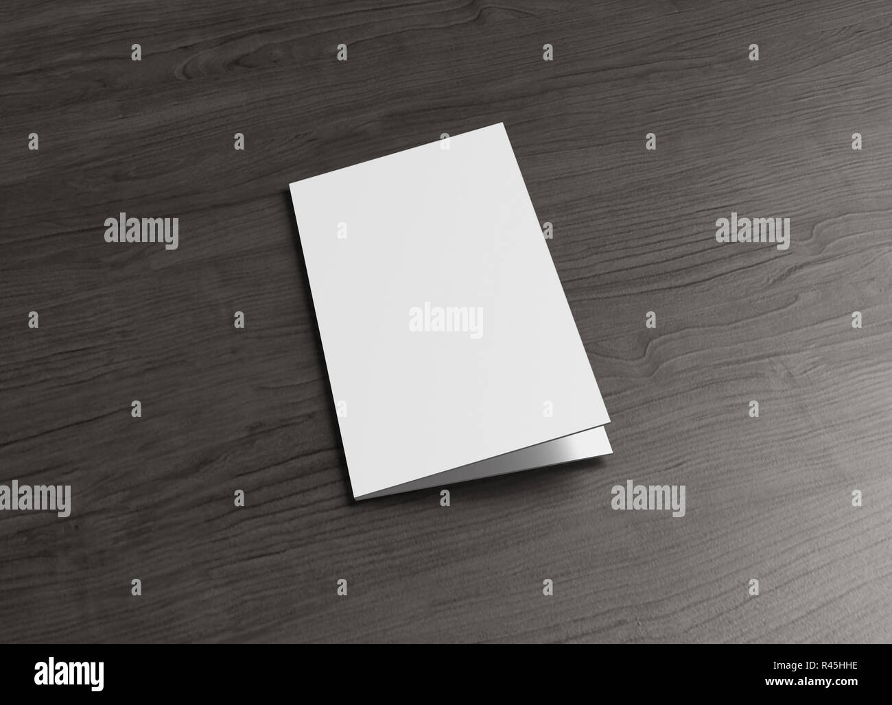 leaflet cover page on wood table Stock Photo - Alamy