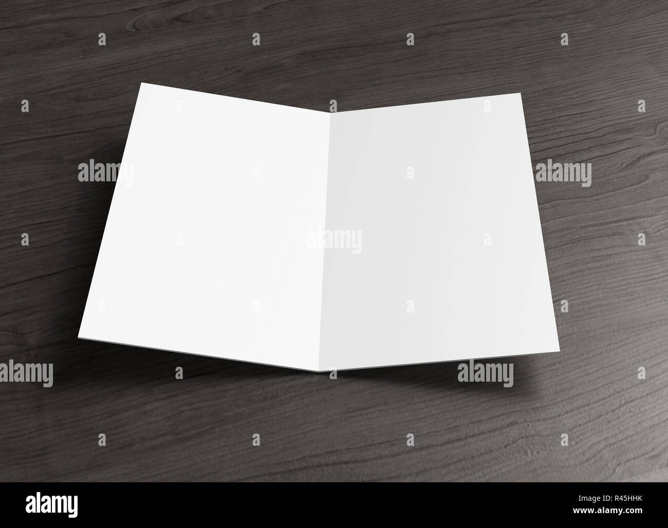 leaflet full open grey wood table Stock Photo - Alamy