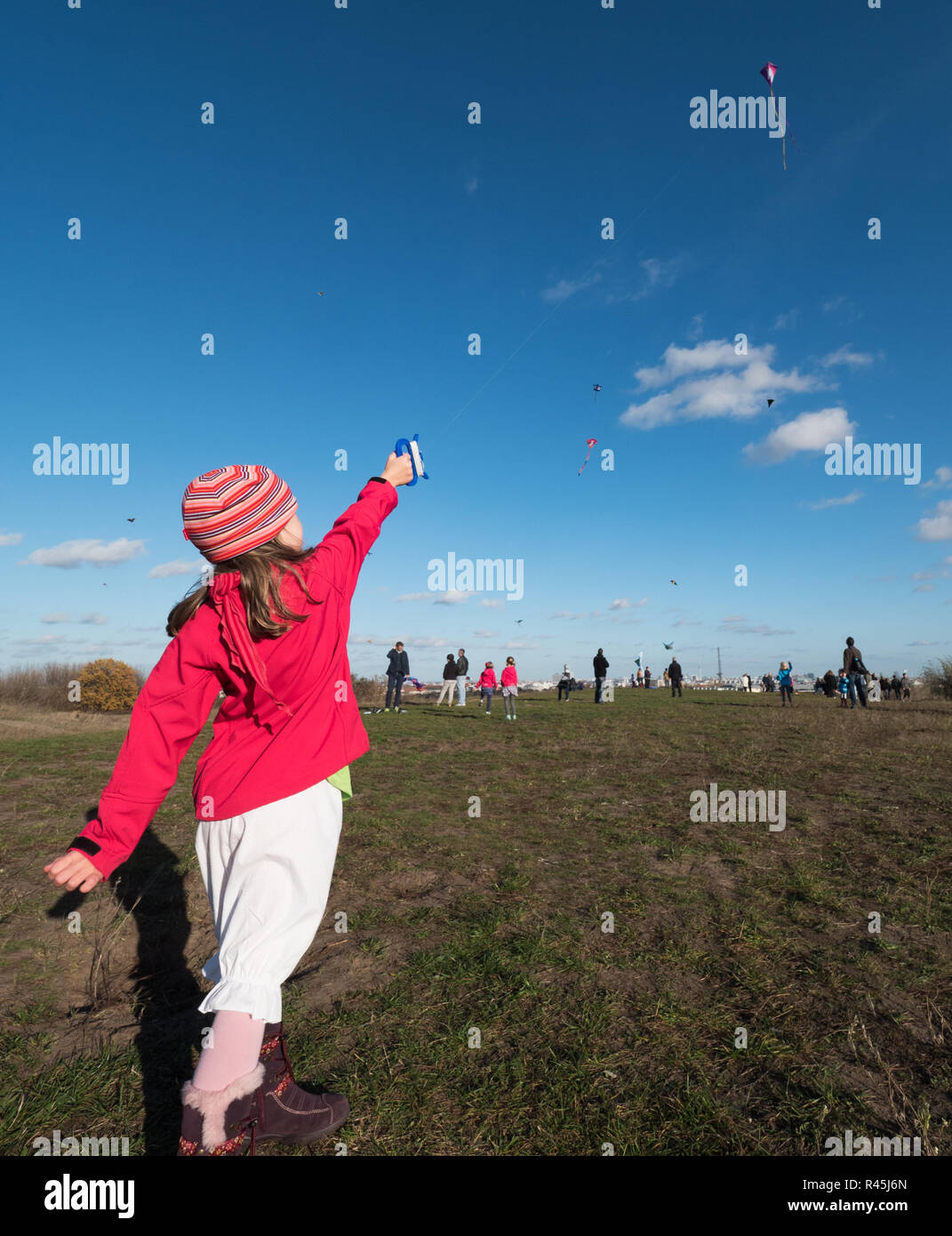 child is flying a kite Stock Photo - Alamy