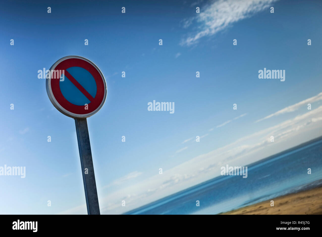 Road sign at the beach Stock Photo - Alamy