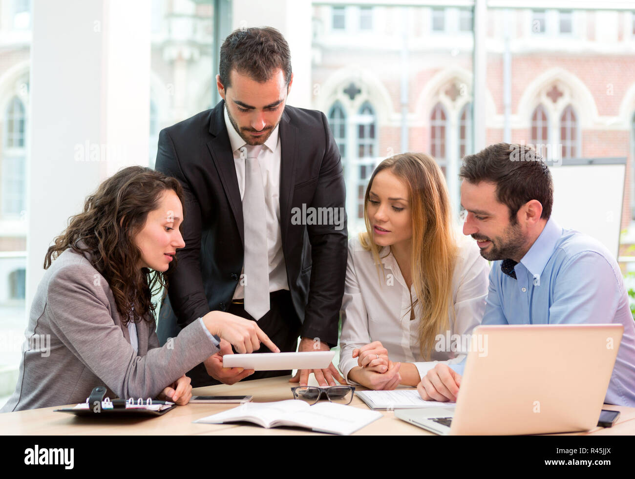 Group of business people working together at the office Stock Photo - Alamy
