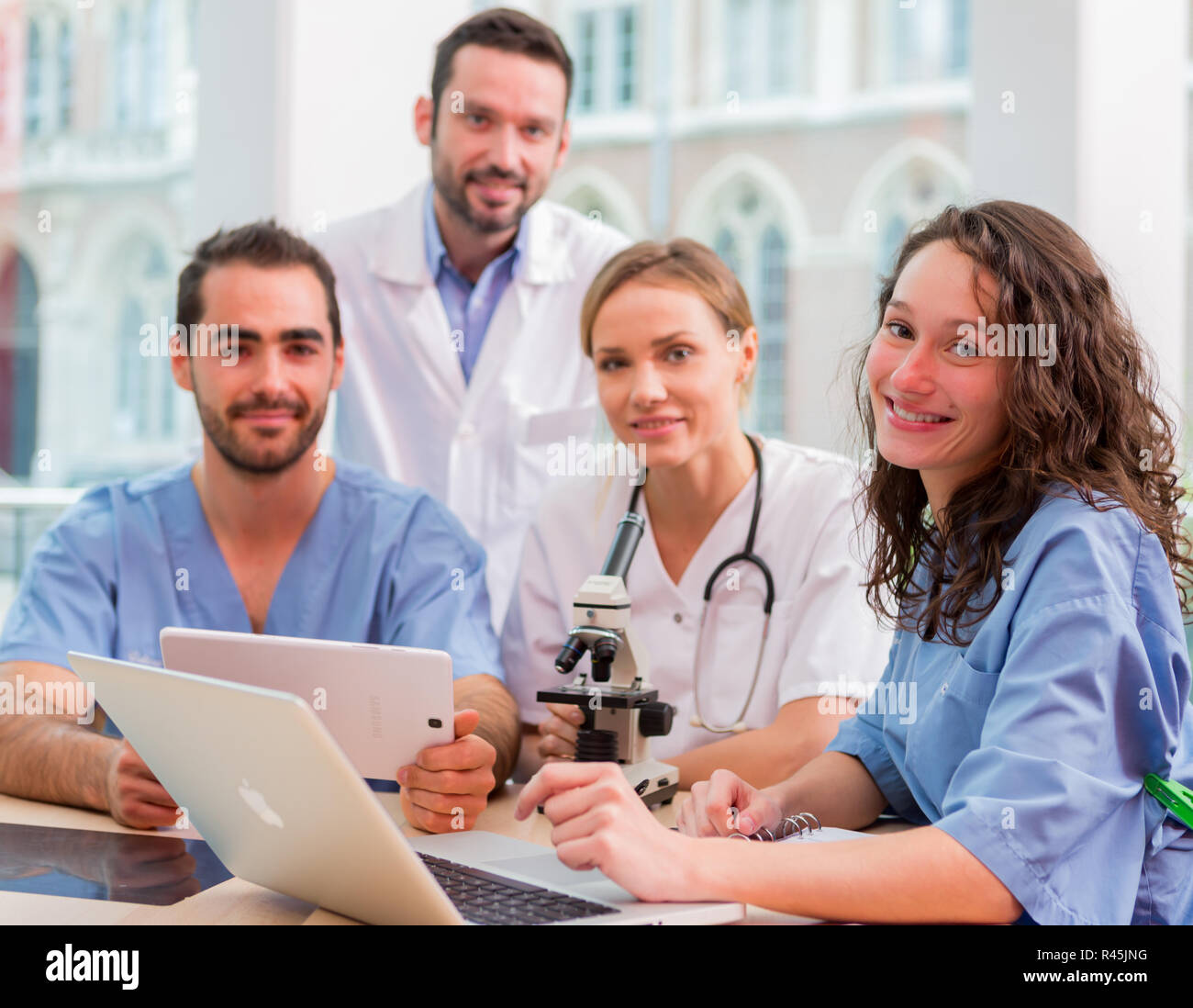 Medical team working at the hospital all together Stock Photo - Alamy
