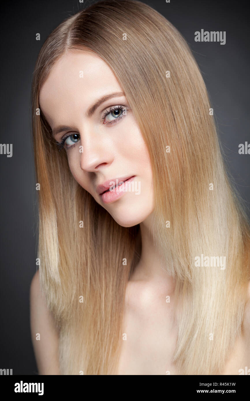 Beautiful lady with straight hair Stock Photo - Alamy