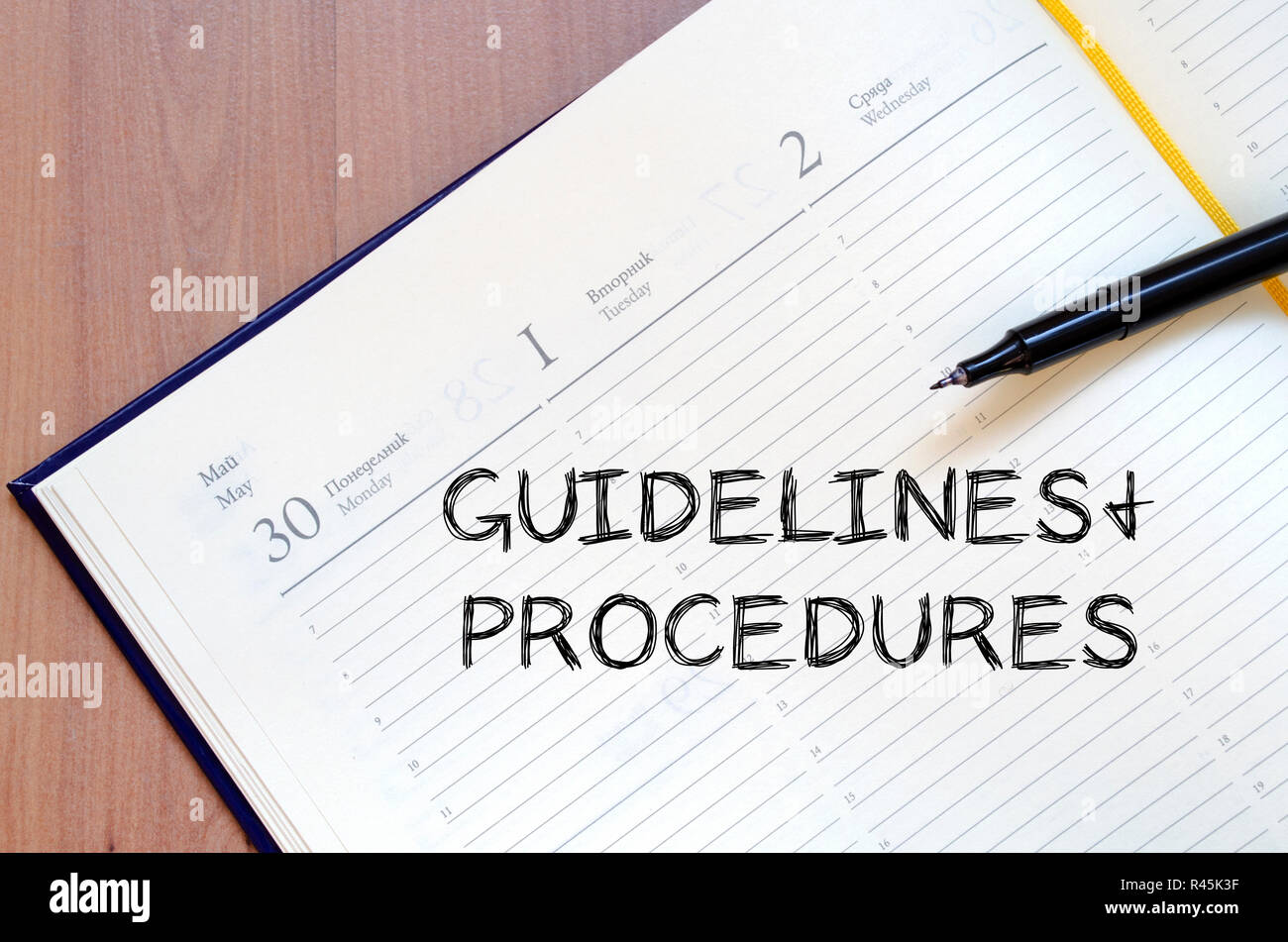 Guidelines and procedures write on notebook Stock Photo - Alamy