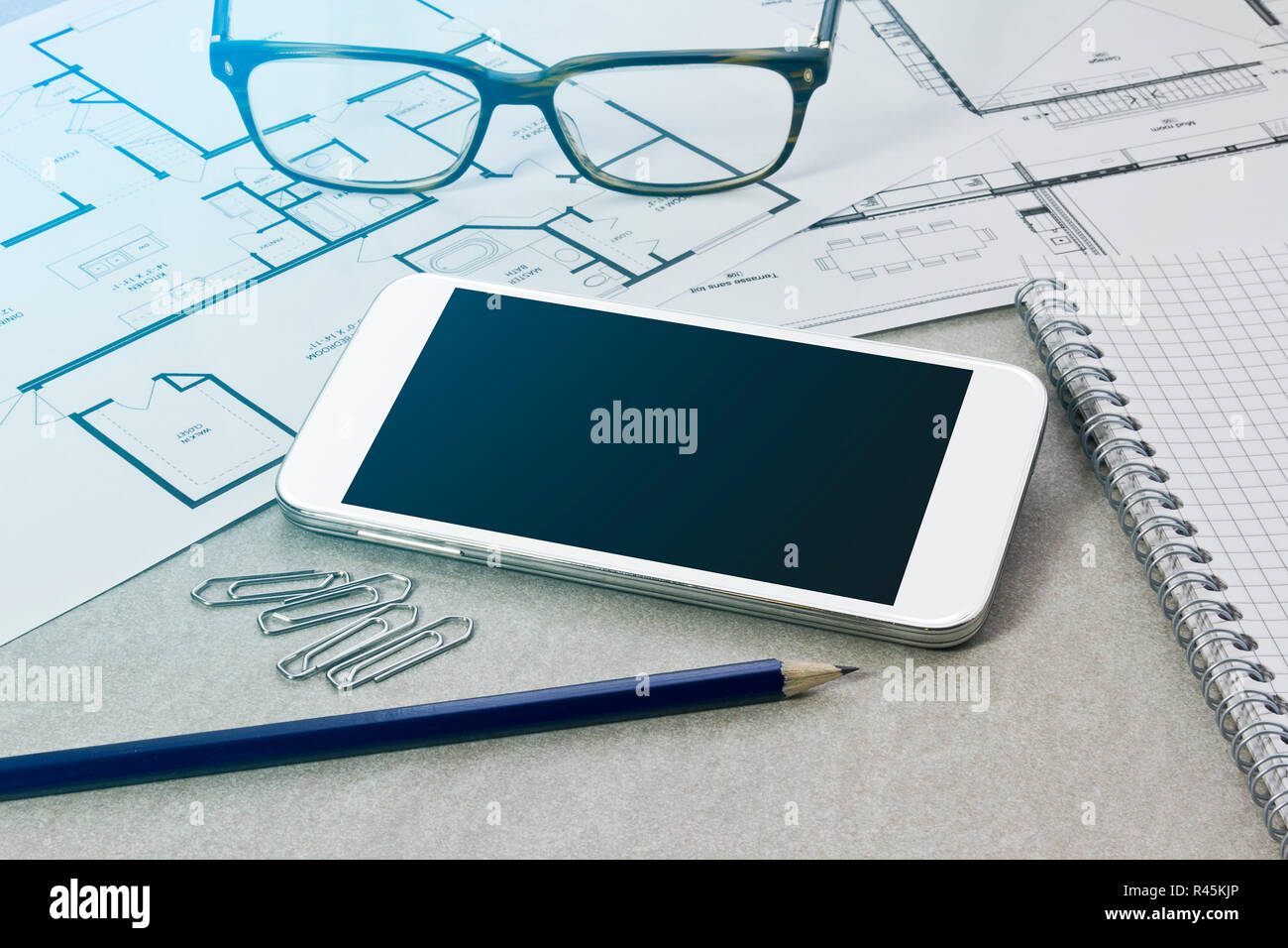 Workplace with mobile phone Stock Photo - Alamy