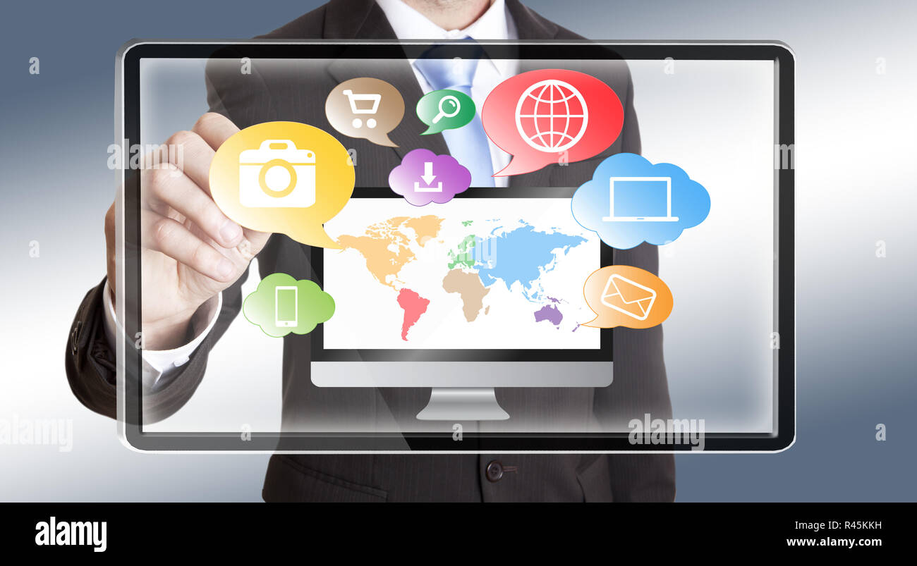 Businessman in his office using tactile interface Stock Photo - Alamy