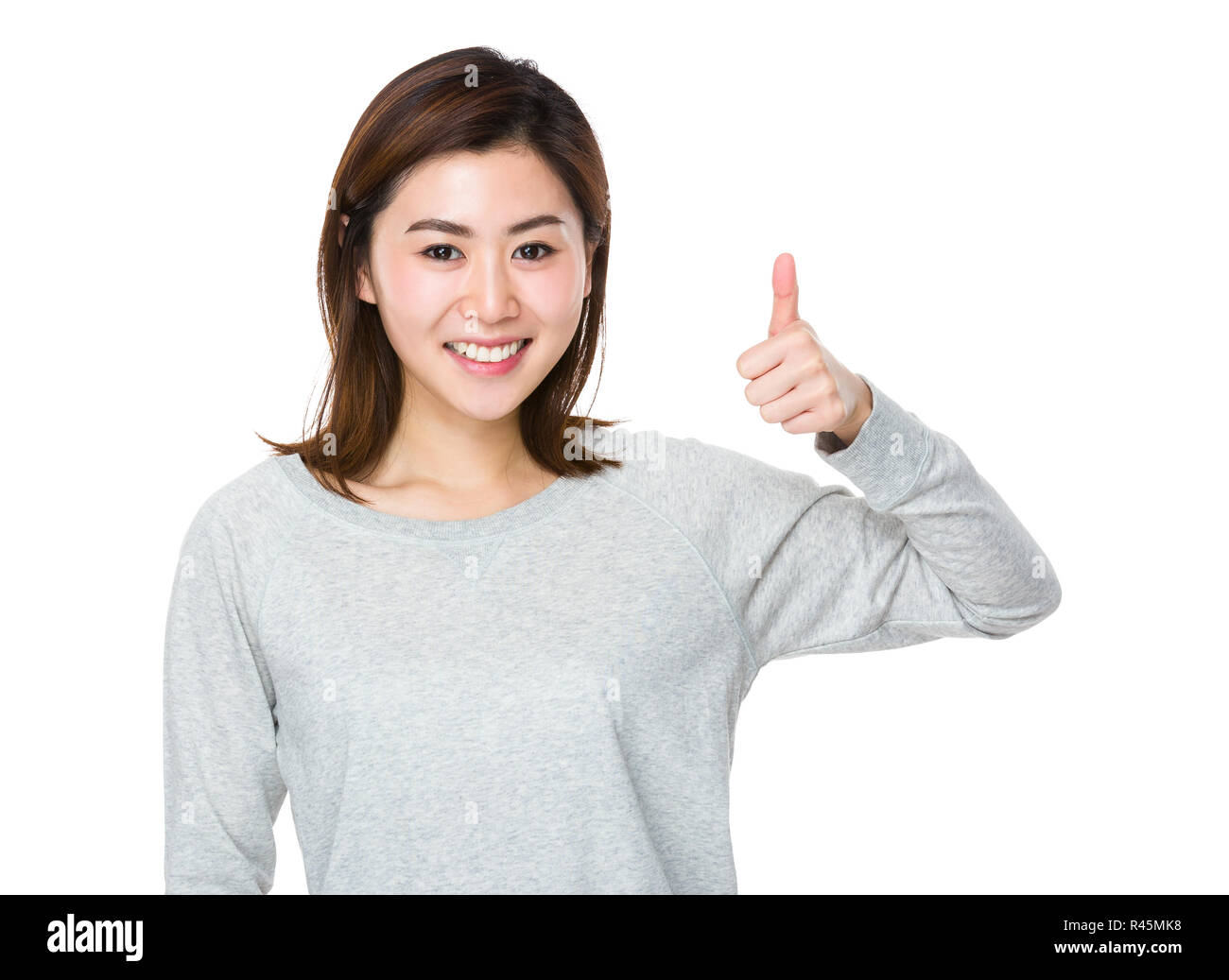 Young woman showing thumb up Stock Photo - Alamy Young woman showing thumb up Stock Photo - Alamy