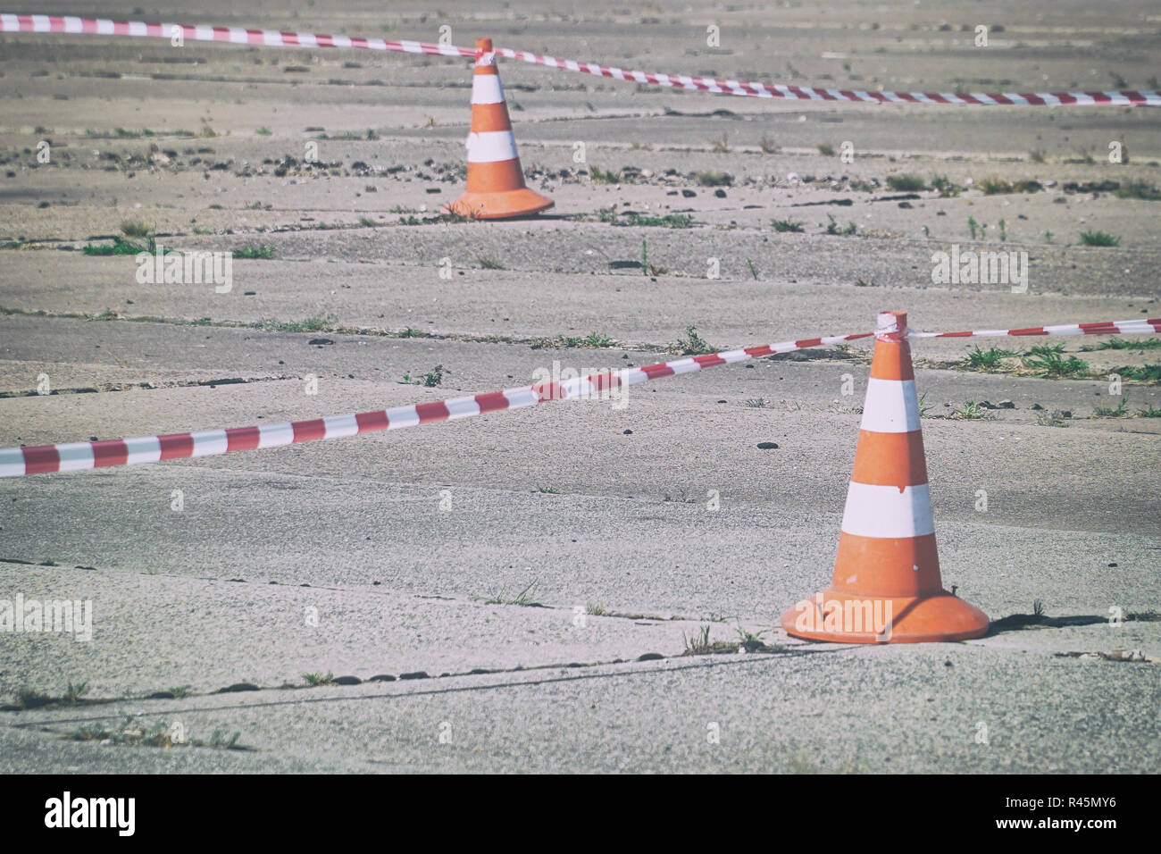 Fencing tape and Traffic cone Stock Photo - Alamy