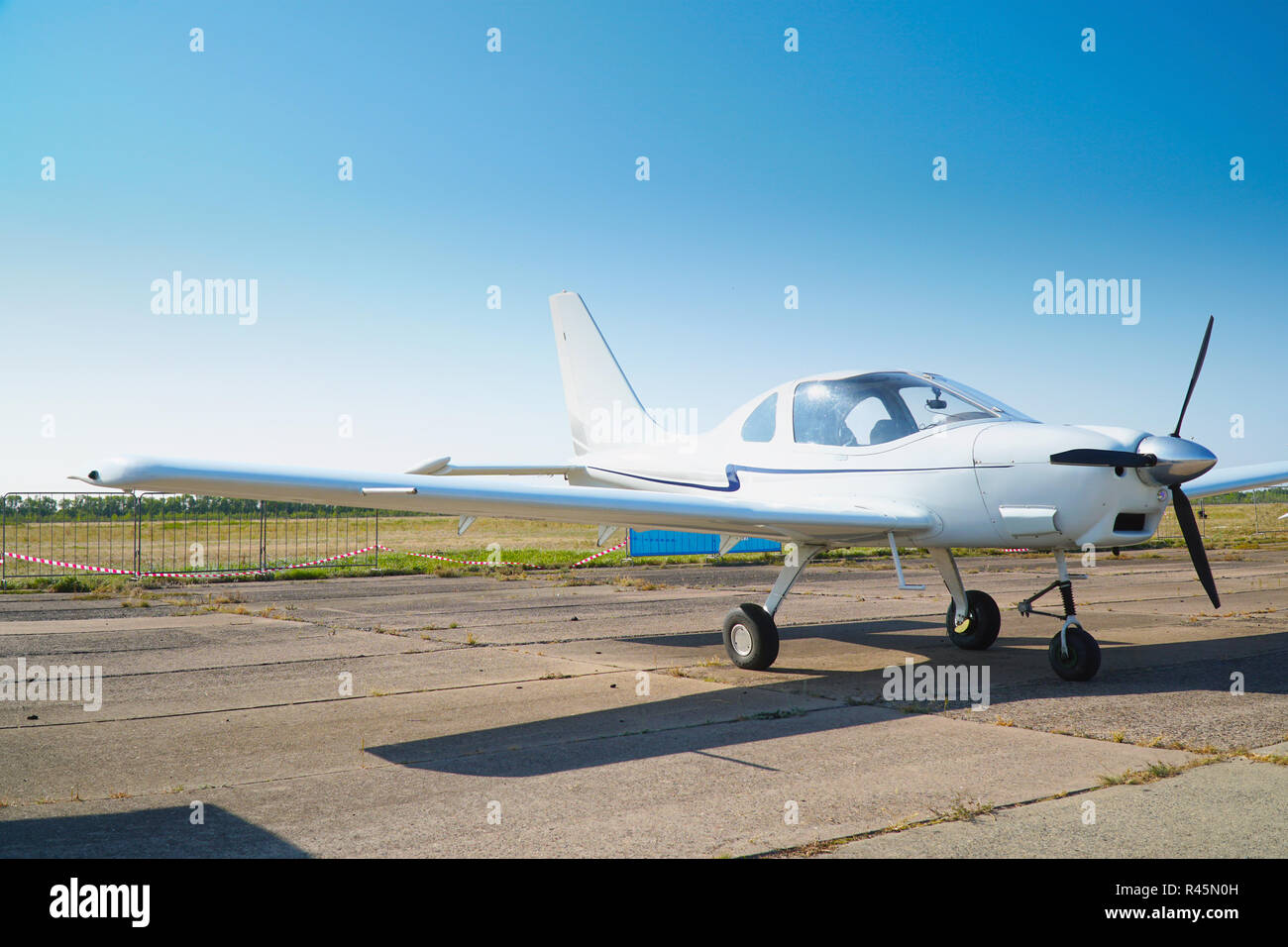 Light single-engine aircraft at the airport Stock Photo - Alamy