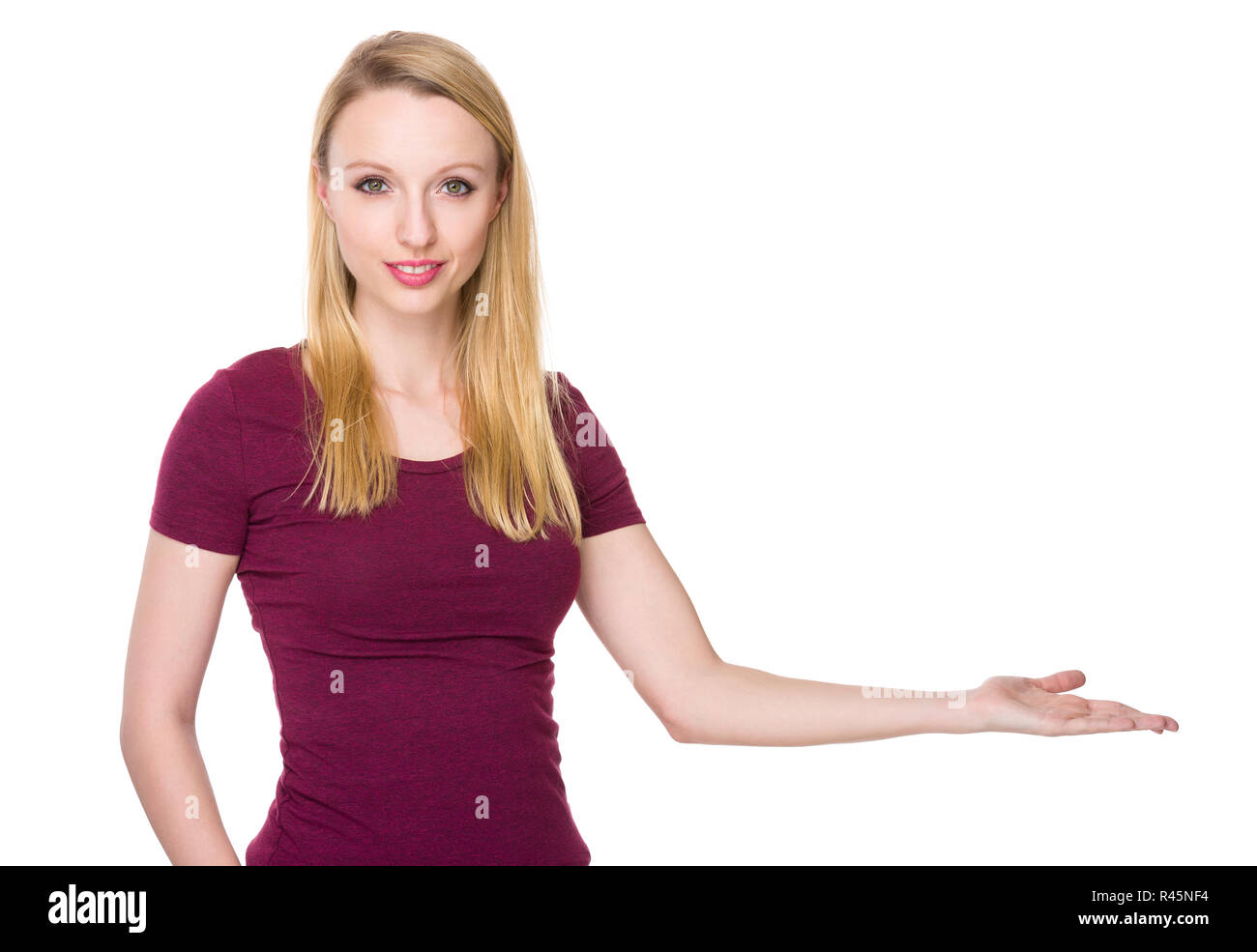 Caucasian young woman showing open hand palm Stock Photo - Alamy