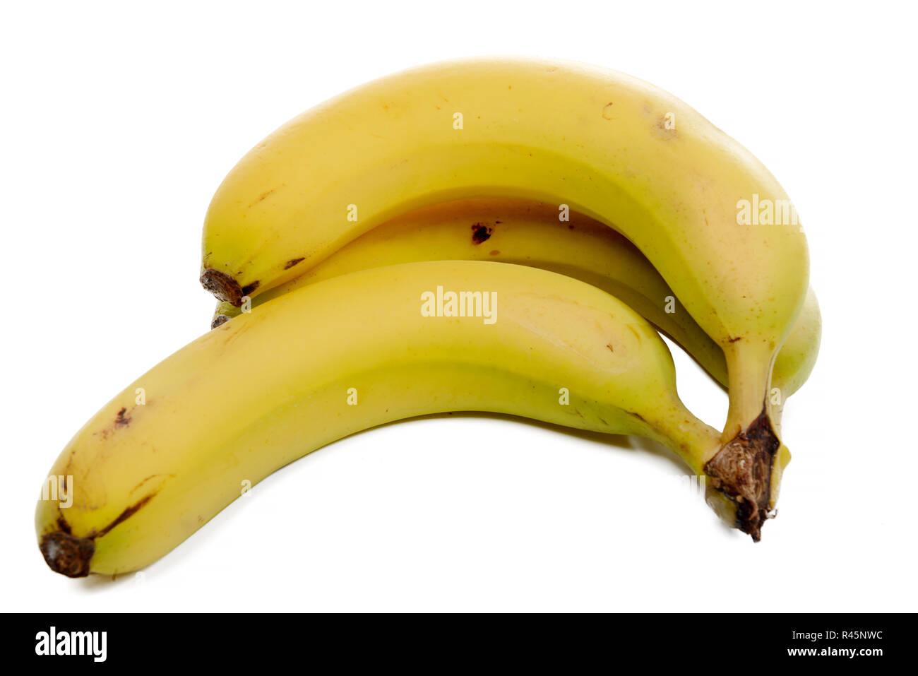 three bananas isolated on a white background Stock Photo - Alamy