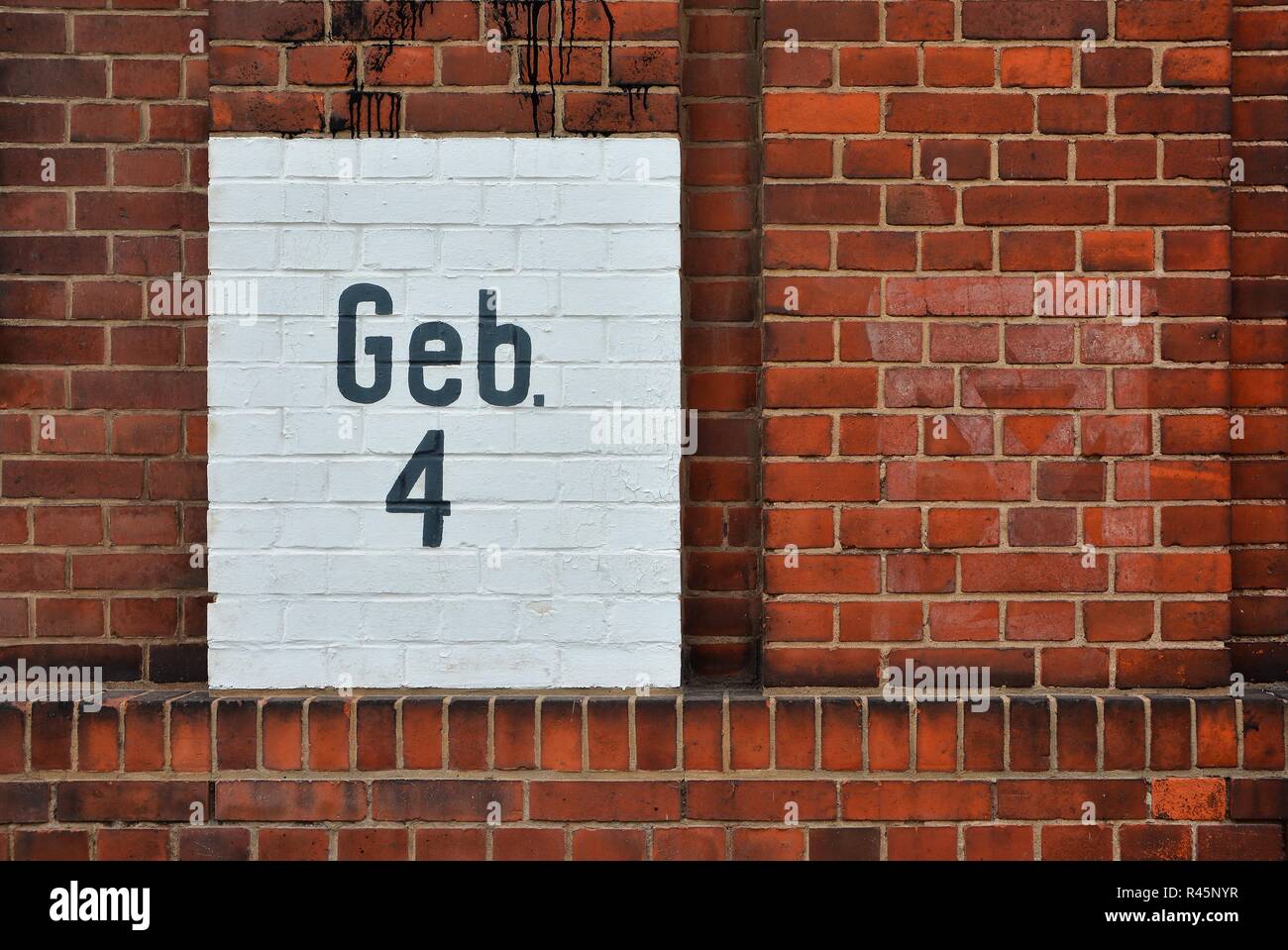 house number on an abandoned industrial building Stock Photo - Alamy