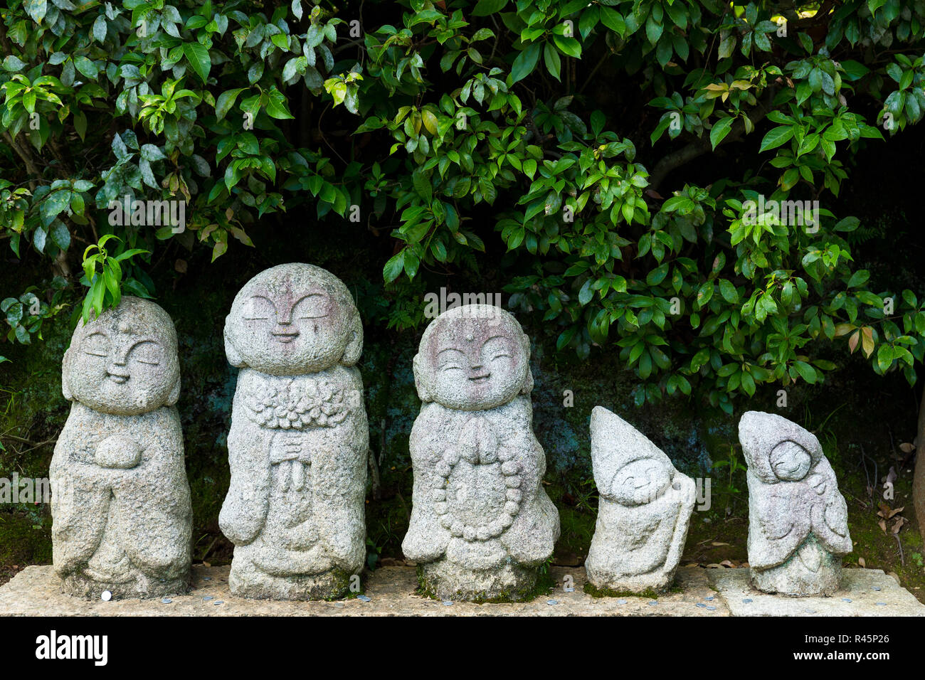Japanese stone dolls Stock Photo - Alamy