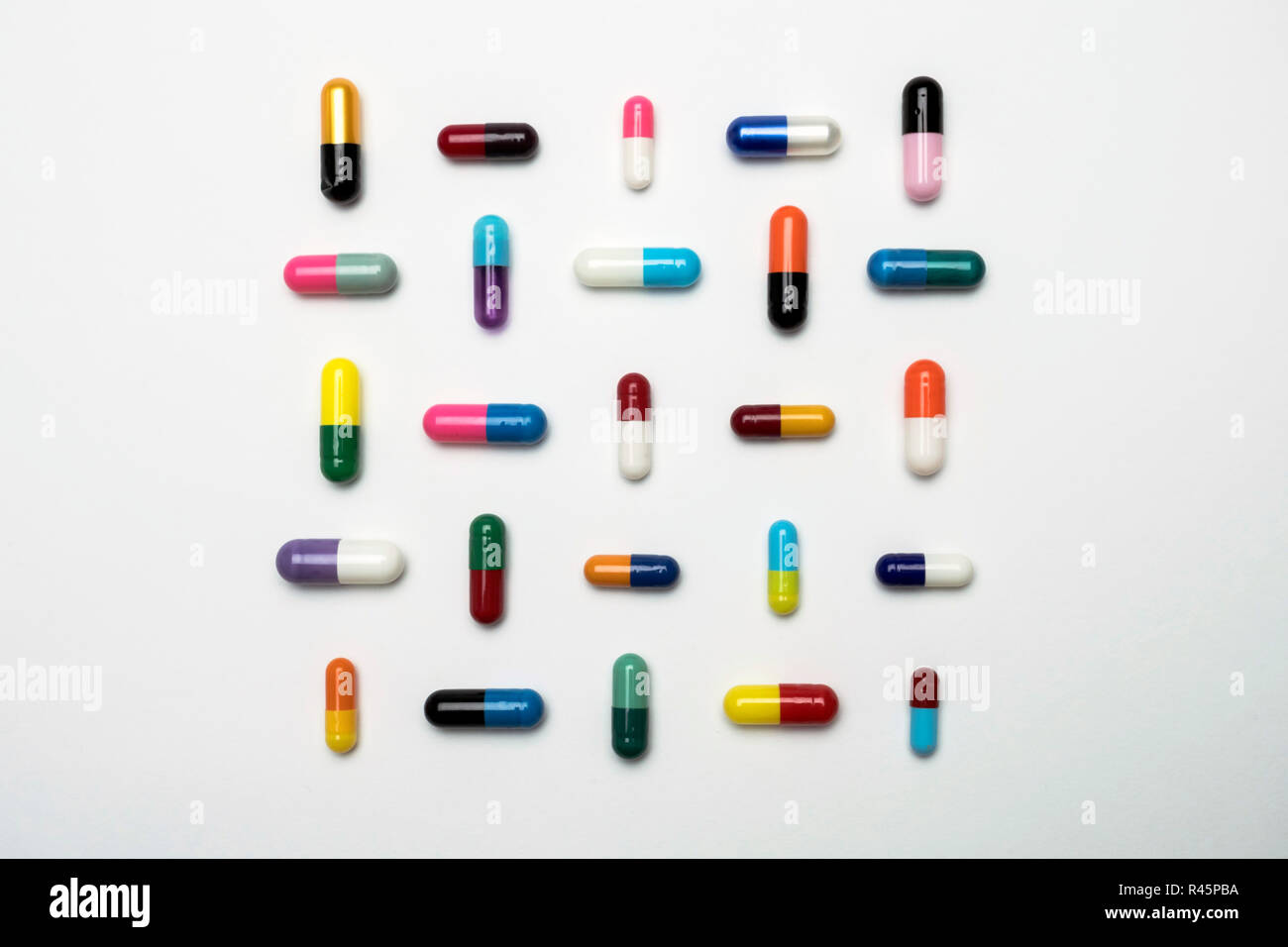 Capsules of different color isolated on white background, conceptual ...