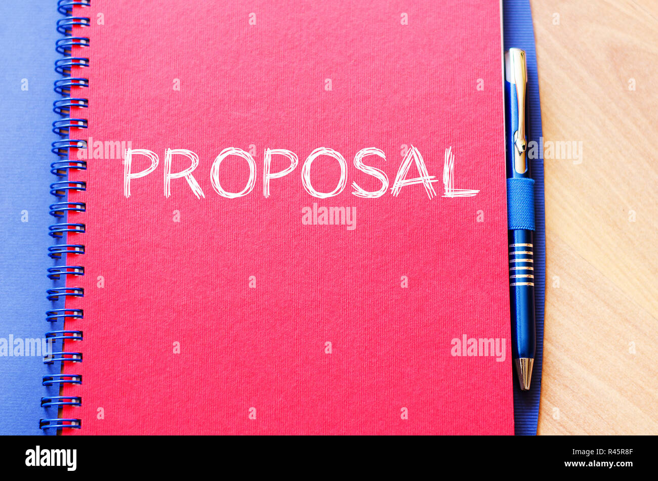 Proposal write on notebook Stock Photo - Alamy