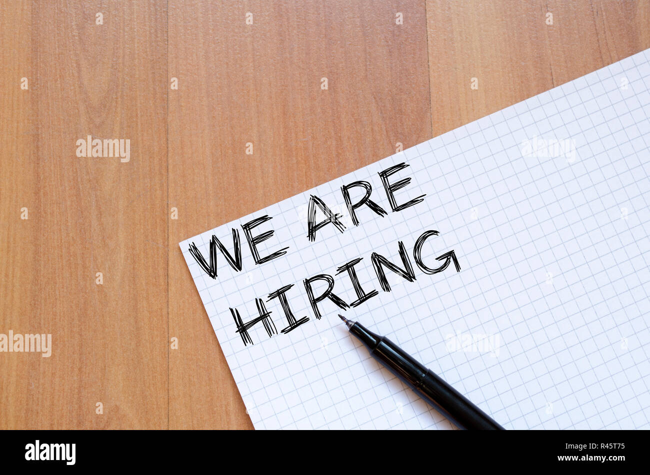 We are hiring write on notebook Stock Photo - Alamy