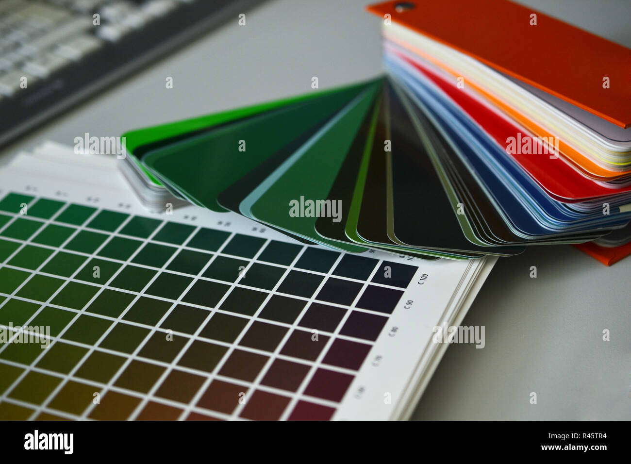 open color fan colorful on a page of color book Stock Photo - Alamy