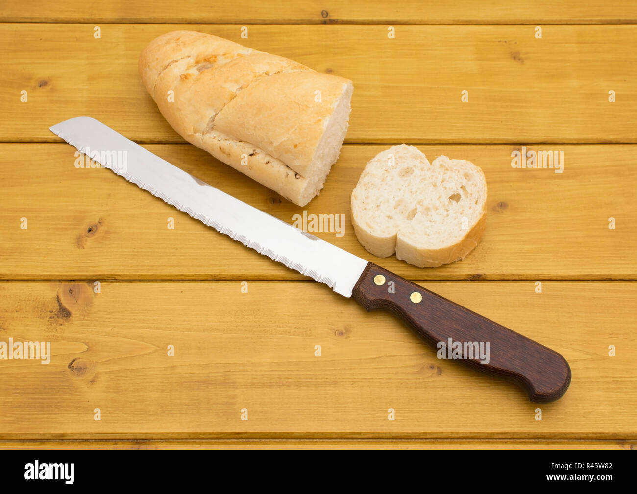 Portion of baguette with a slice cut off Stock Photo - Alamy
