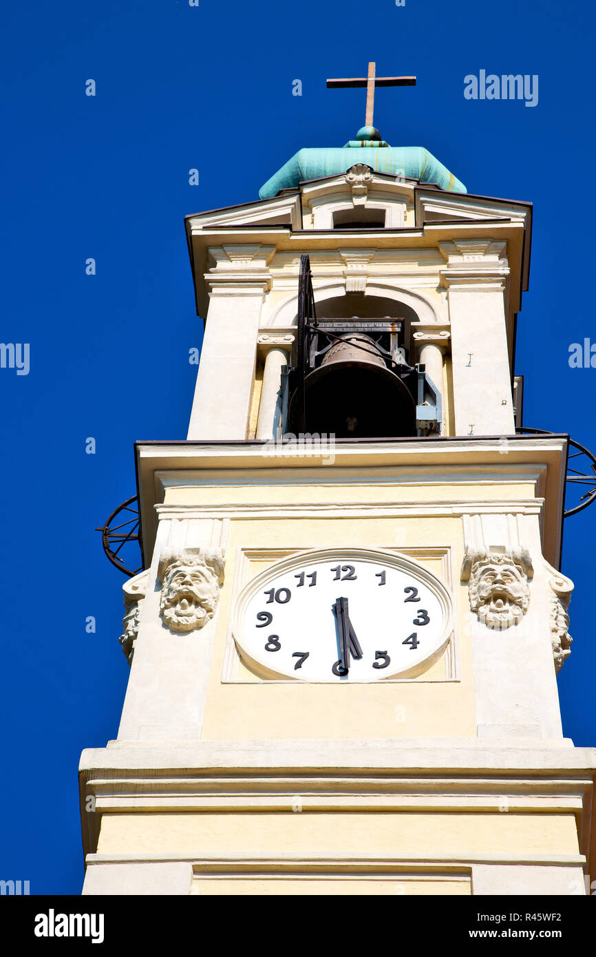 ancien clock tower in old stone and bell Stock Photo - Alamy
