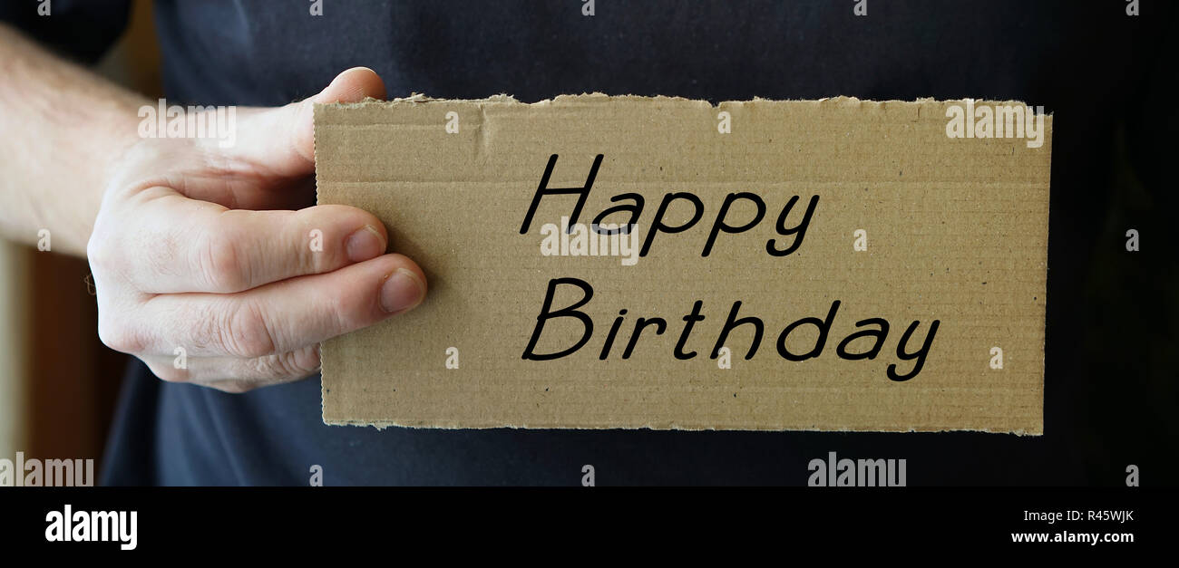 birthday greeting on a piece of cardboard Stock Photo - Alamy