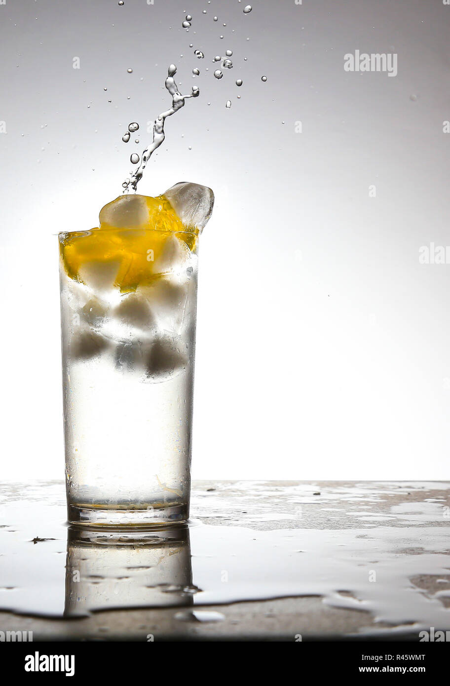 Lemon juice ice and water drops Stock Photo - Alamy