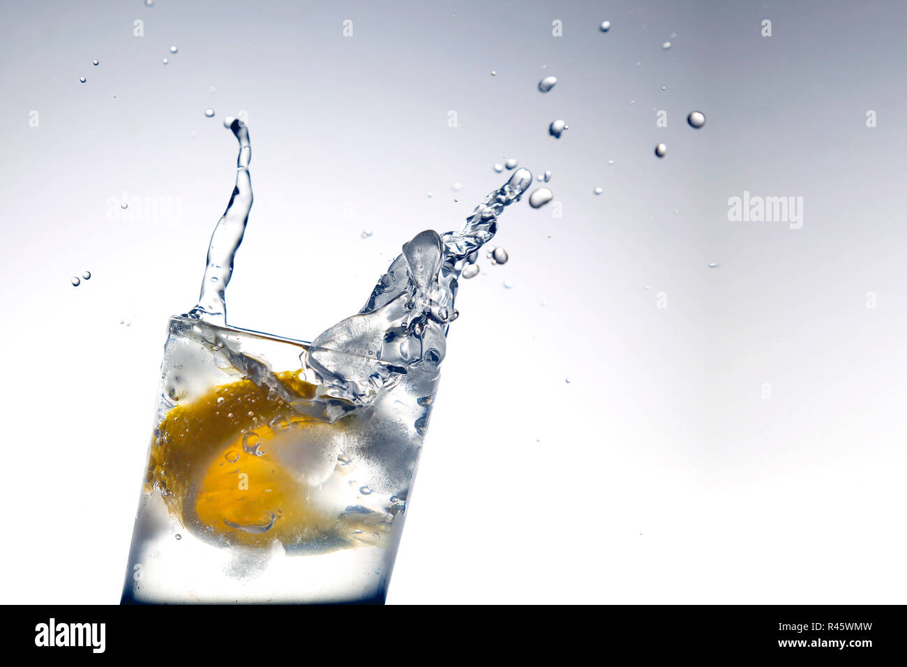 Lemon ice and water drops Stock Photo - Alamy