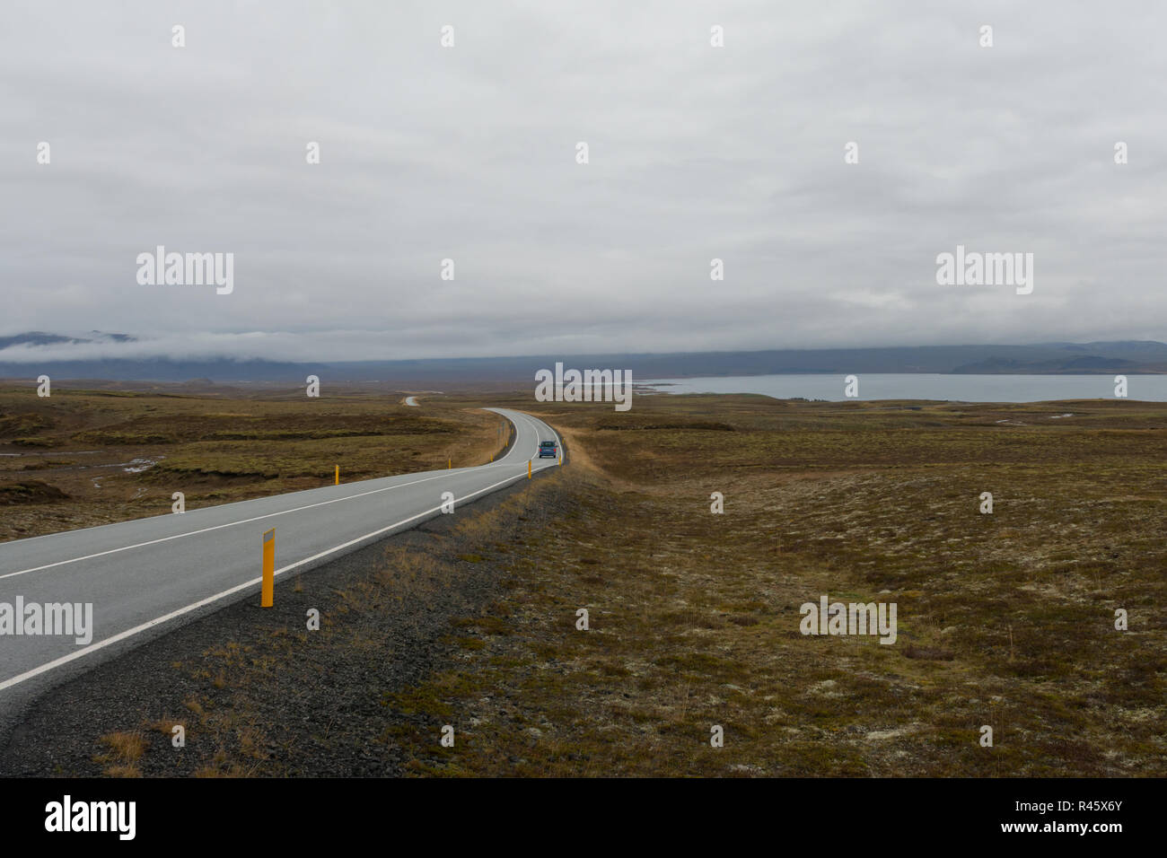 Empty hardened asphalt road in Iceland Stock Photo - Alamy