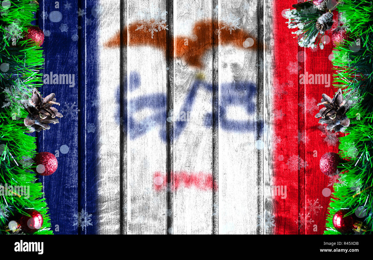 Wooden Christmas background with blurred flag State of Iowa. There is a ...