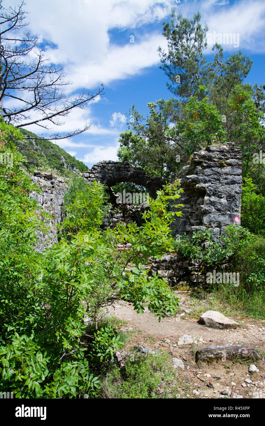 On the old path that once connecting Labin and Rabac stand the ruins of ...