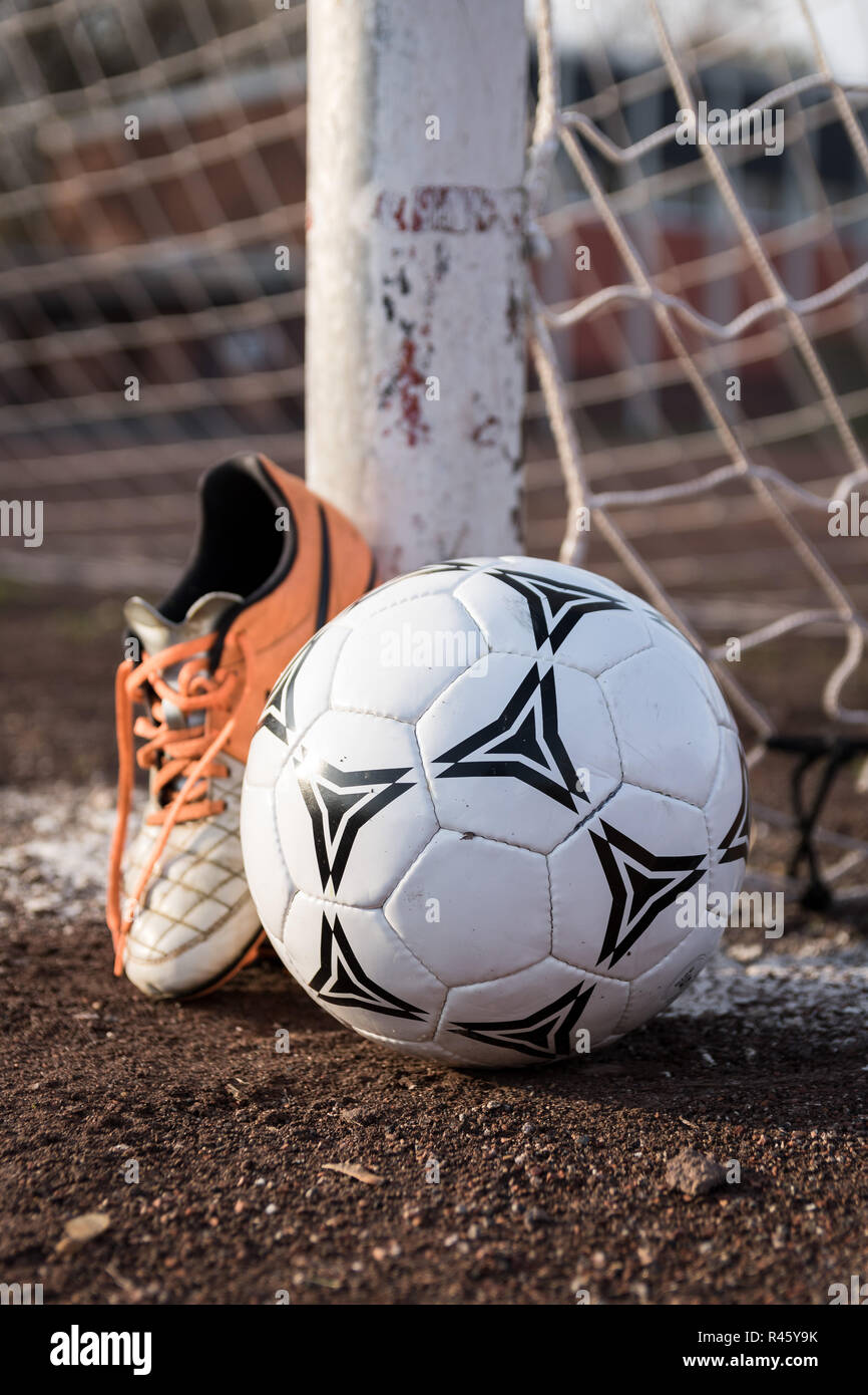 soccer ball and shoes Stock Photo - Alamy
