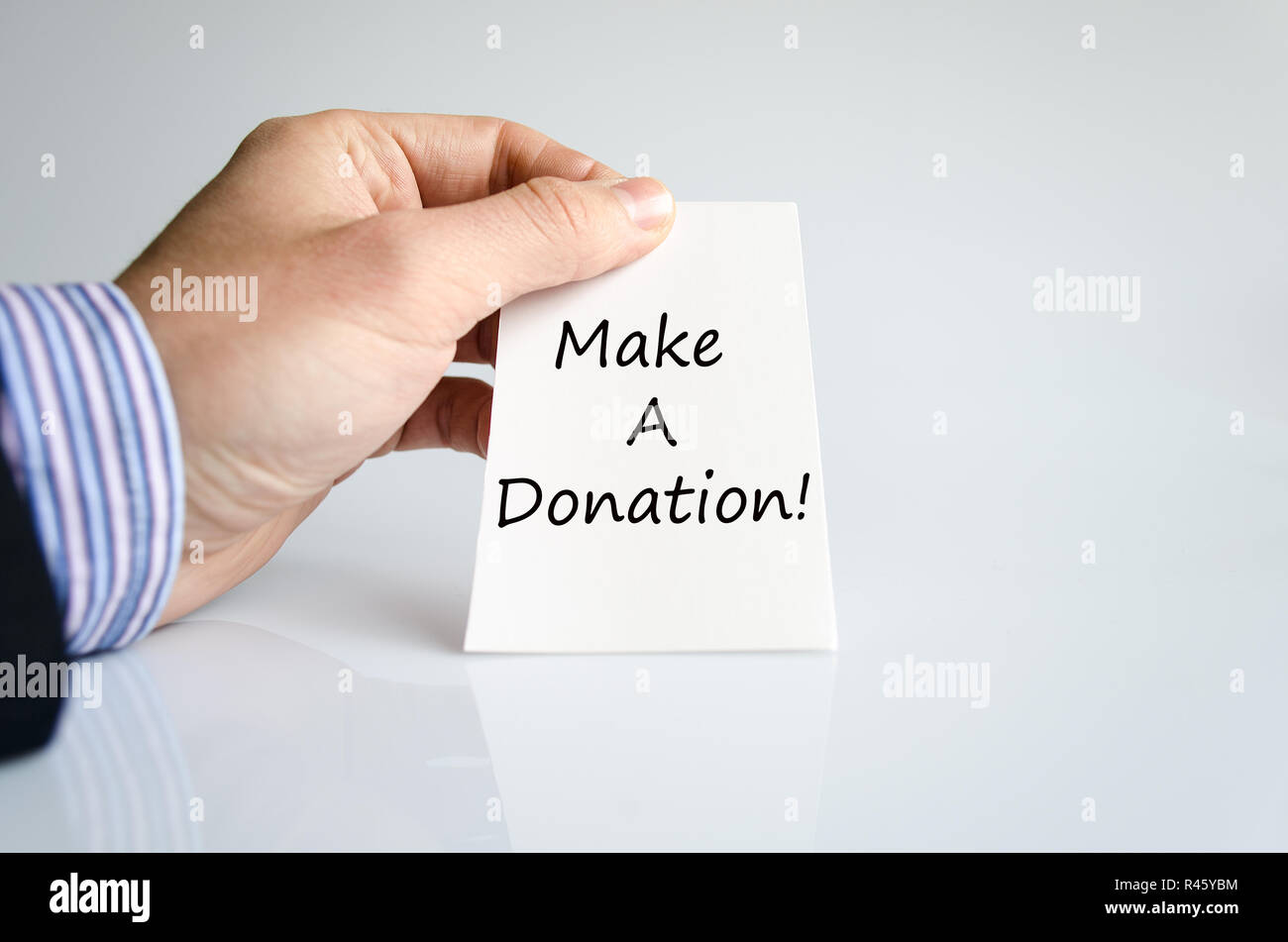 Make a donation text concept Stock Photo - Alamy