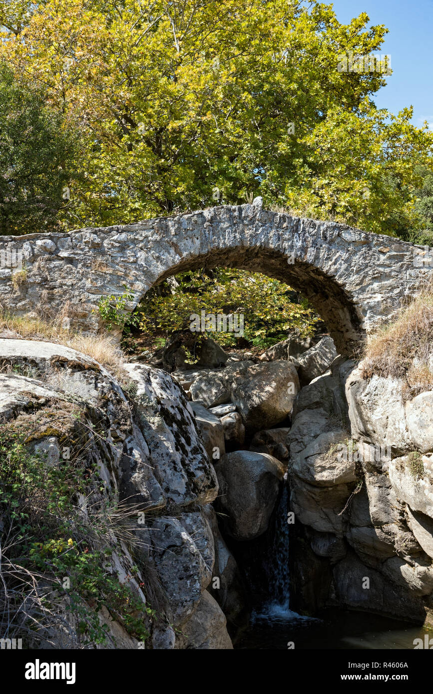 View of the traditional stone bridge of Damaskinos near Verdikoussa in ...