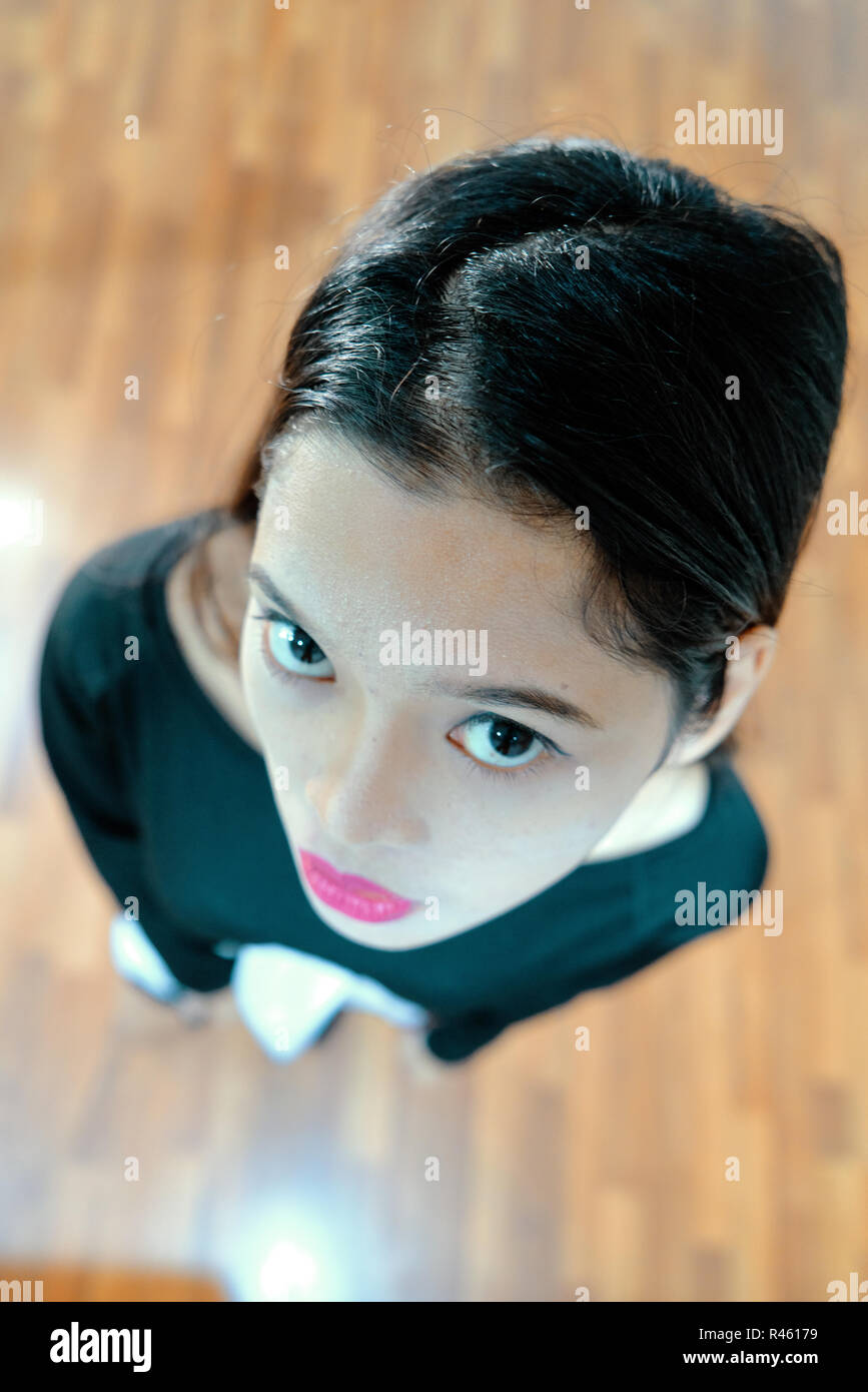 Beautiful woman posing - look up, facial expression, serious woman ...