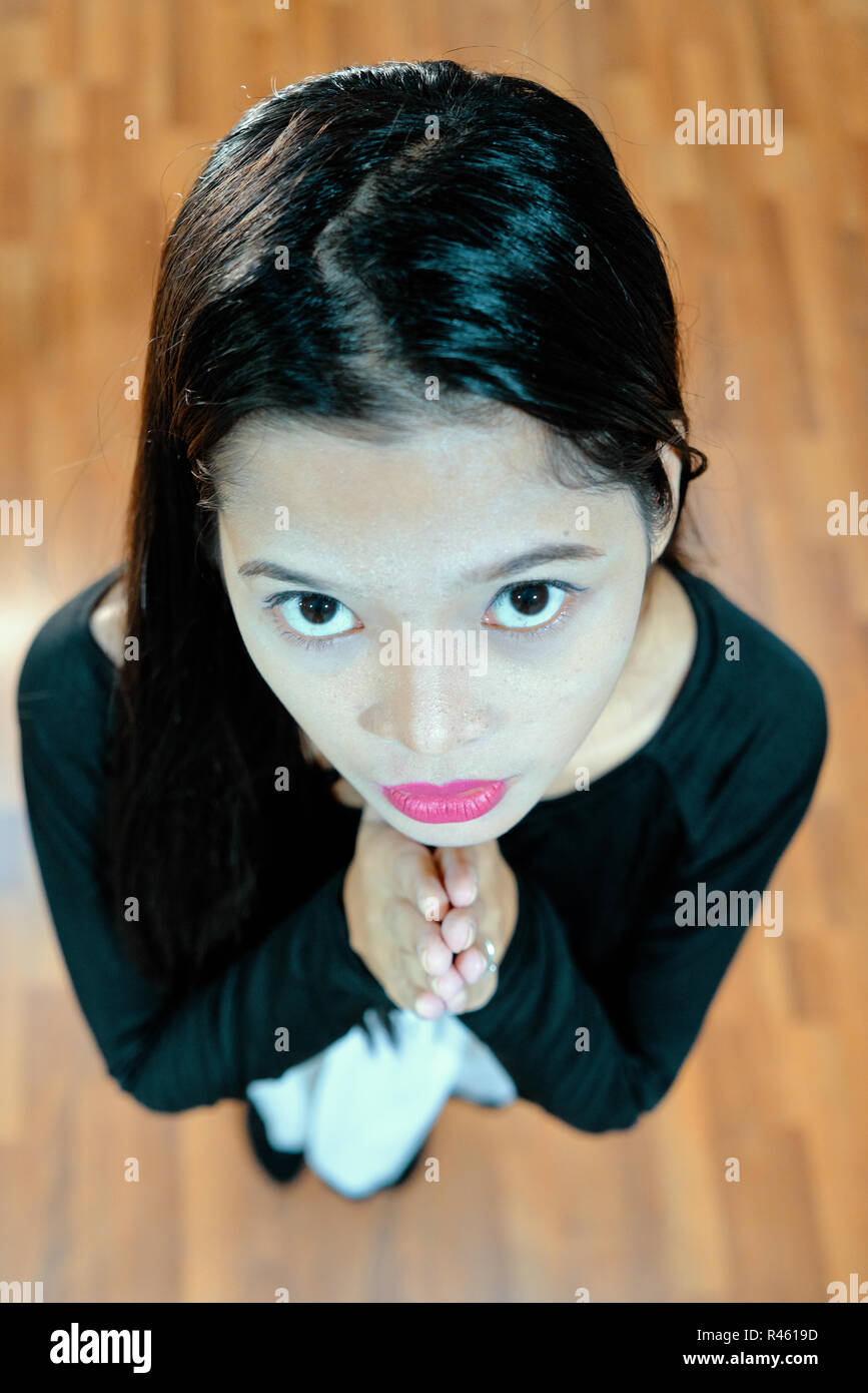 Beautiful woman posing - look up, facial expression, begging, praying ...