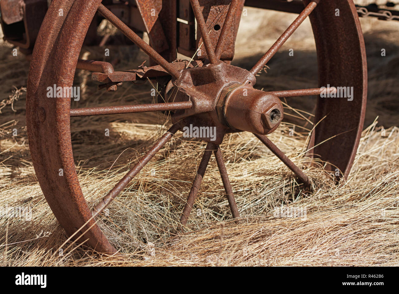 Wagon Wheel in Straw Stock Photo - Alamy