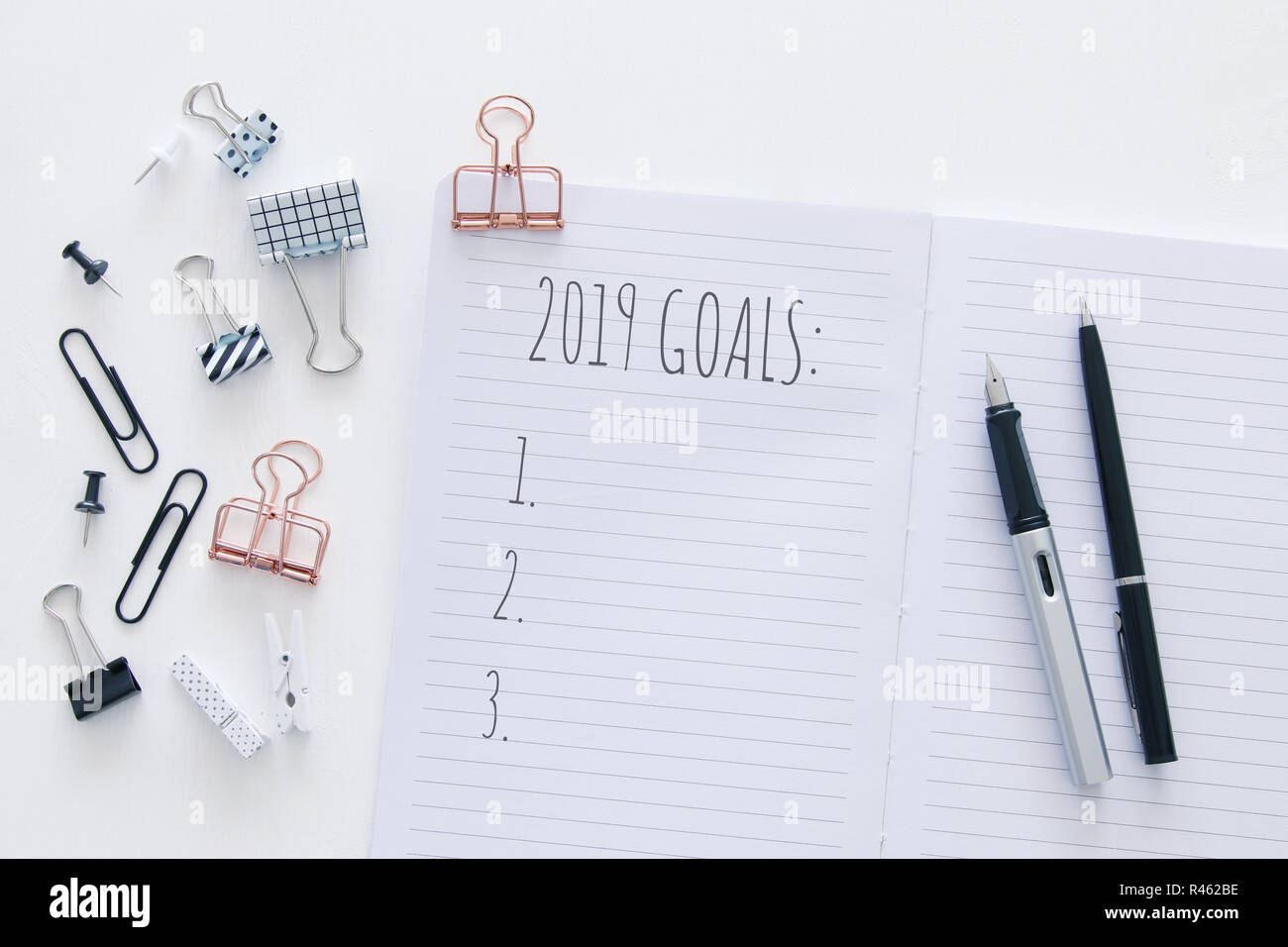 Top view 2019 goals list with notebook over white wooden desk Stock ...