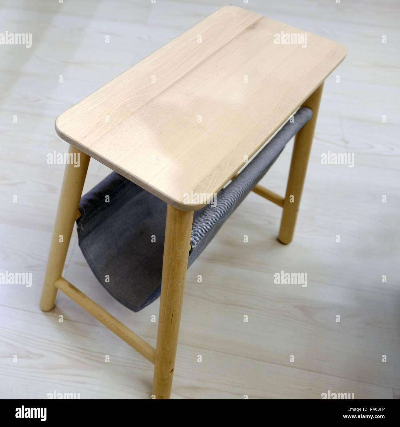 wooden stool. wooden chair on light background. close-up view from ...