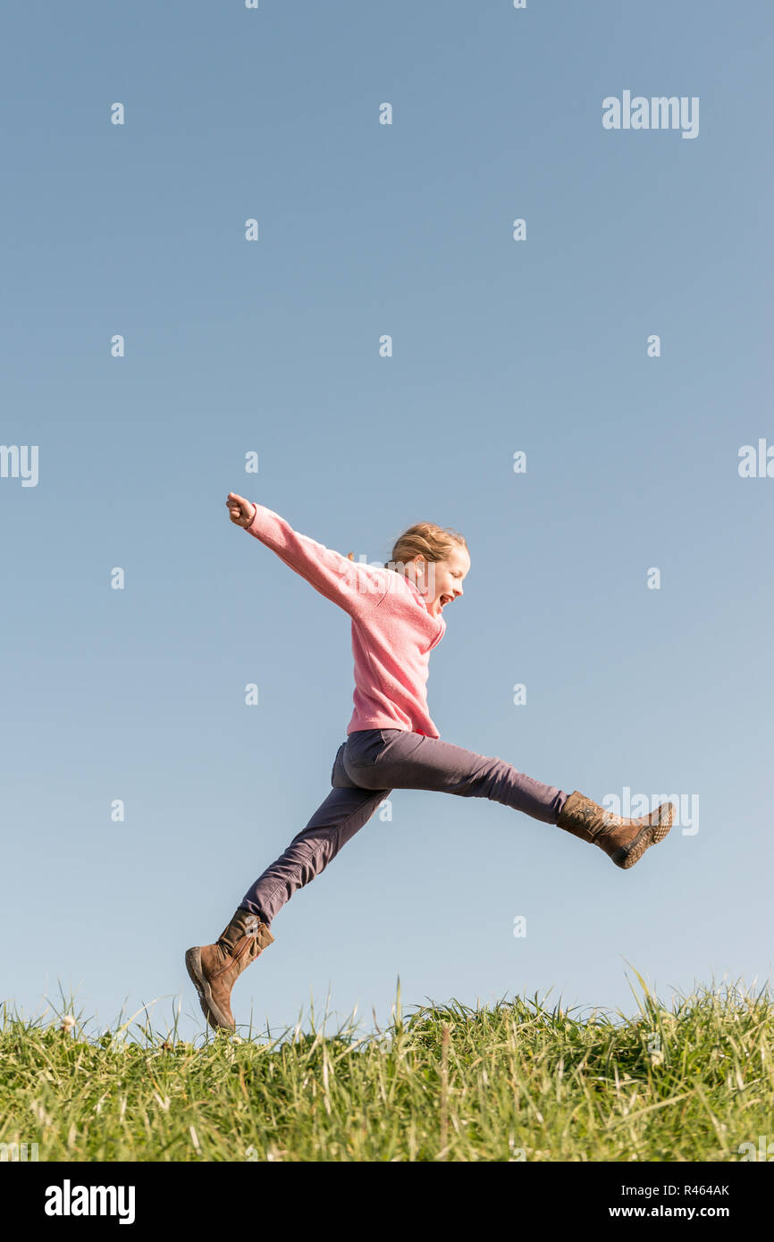 Girls leap hi-res stock photography and images - Alamy