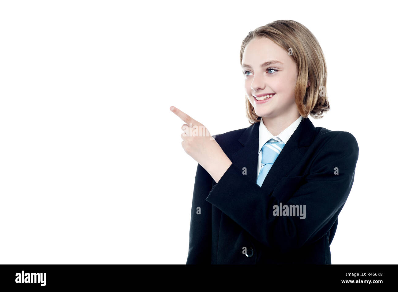 Pretty business girl pointing at something Stock Photo - Alamy