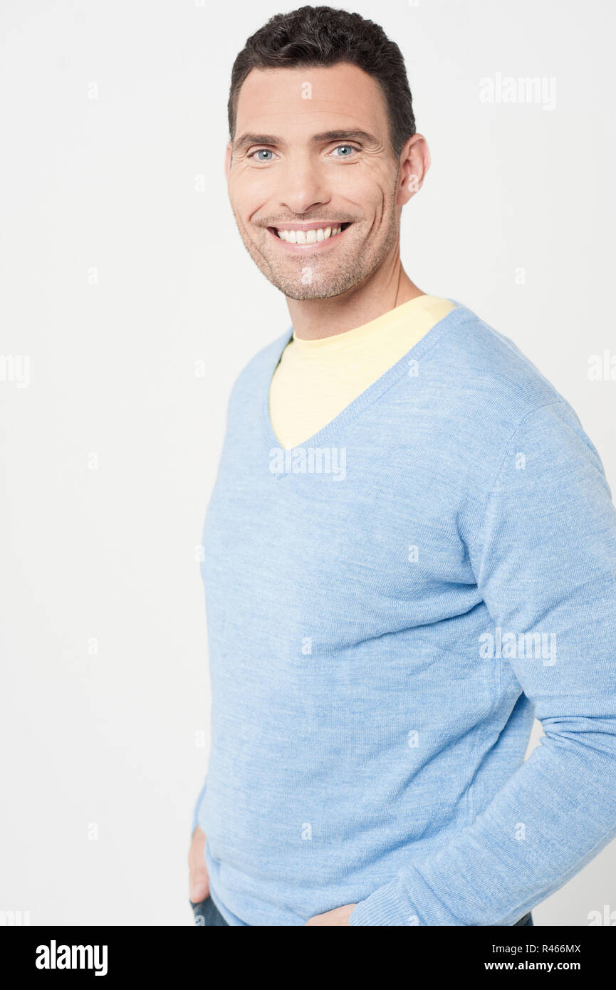 Happy man posing casually Stock Photo - Alamy