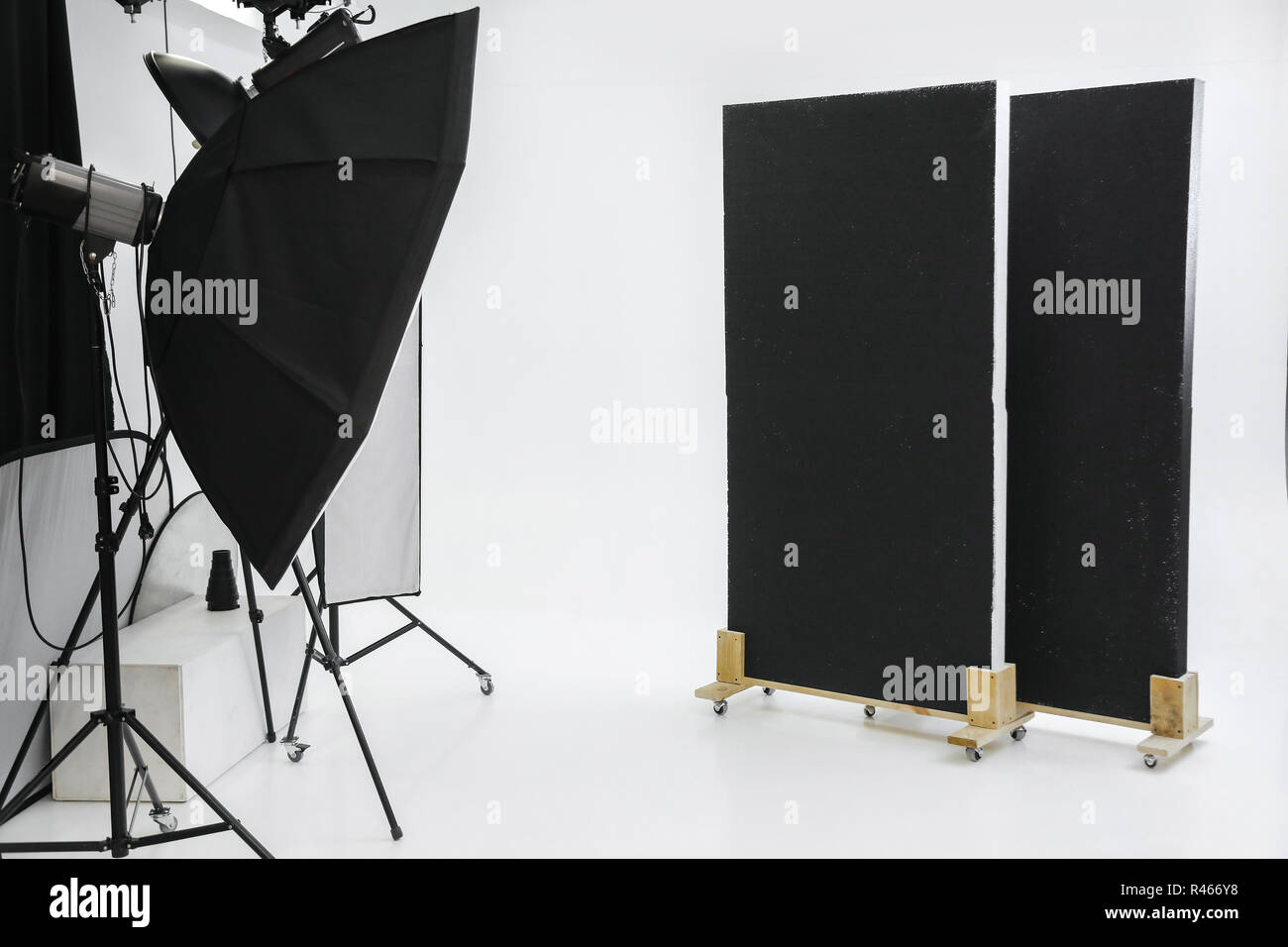 Empty photo studio with lighting equipment Stock Photo - Alamy