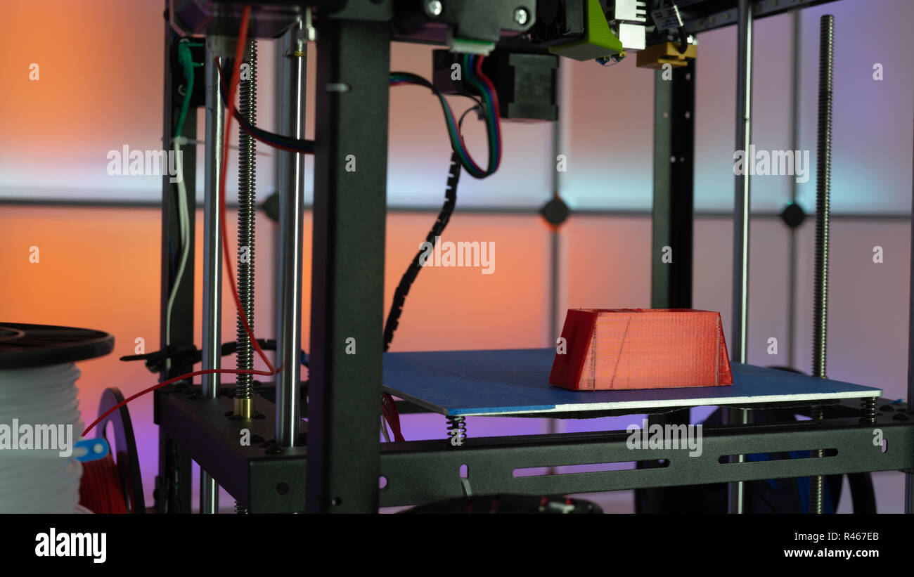 3d printer and plastic filament on color background Stock Photo - Alamy