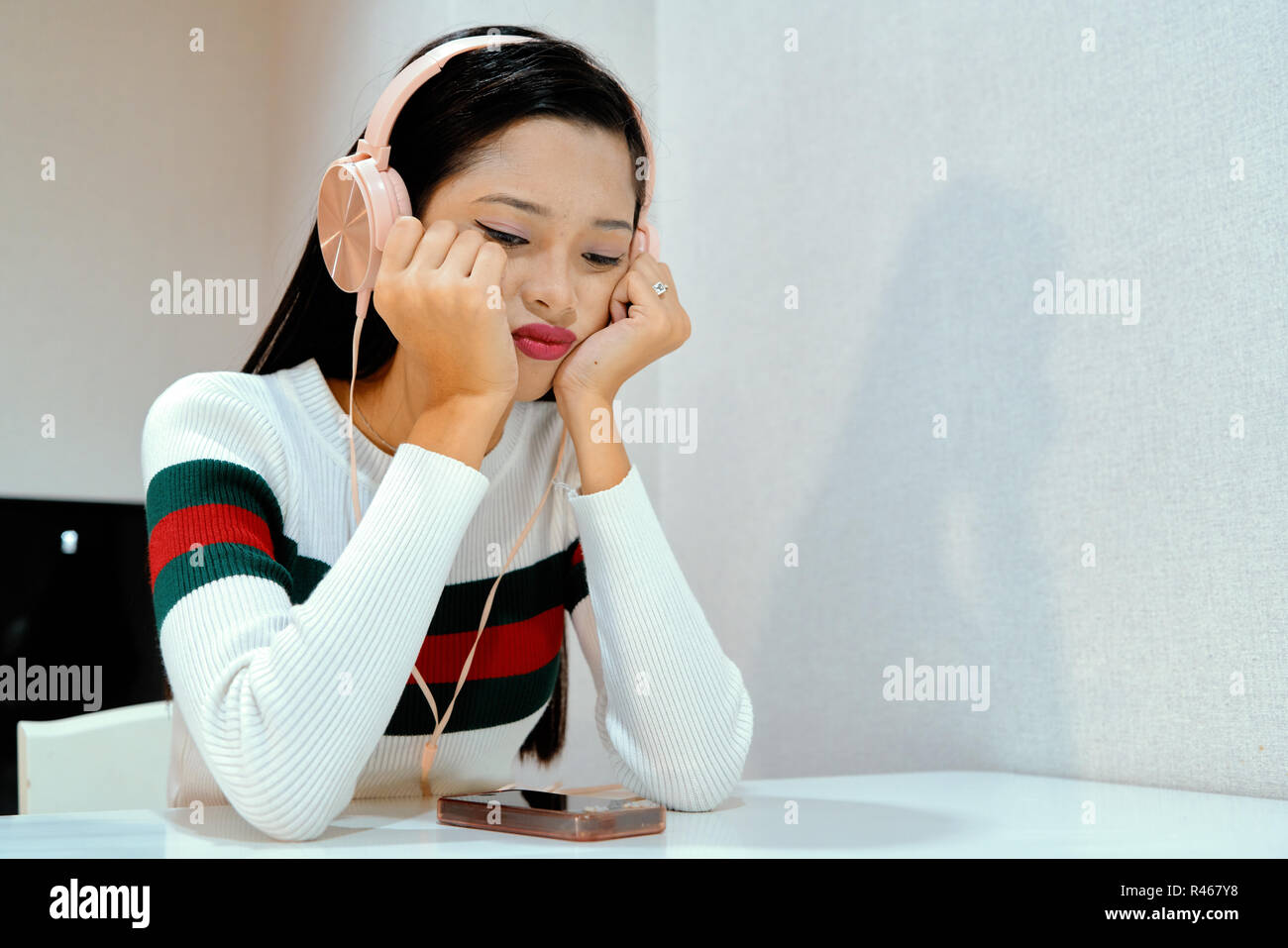 Beautiful woman posing - listening music, thinking, sad woman Stock ...