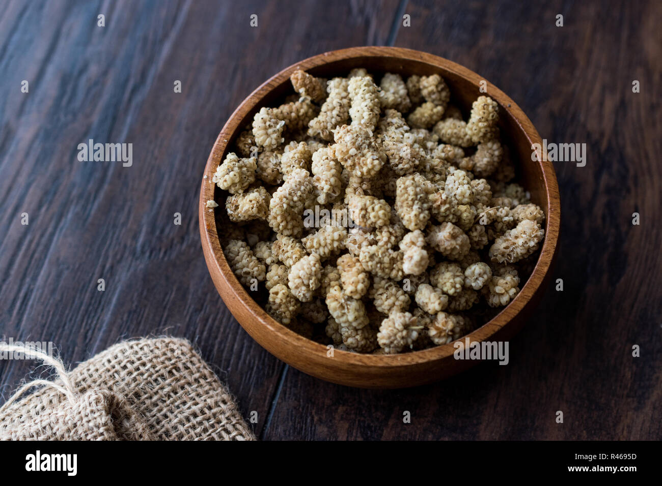 Sun Dried Mulberries in Wooden Bowl. Organic Food Stock Photo - Alamy