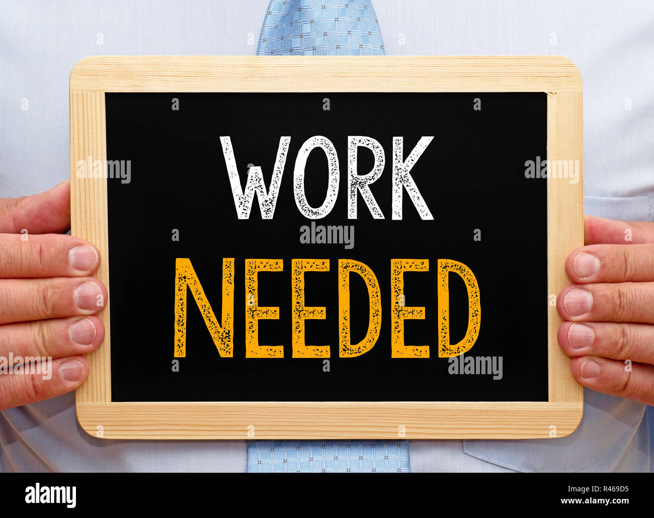 Work needed - Manager with chalkboard Stock Photo - Alamy