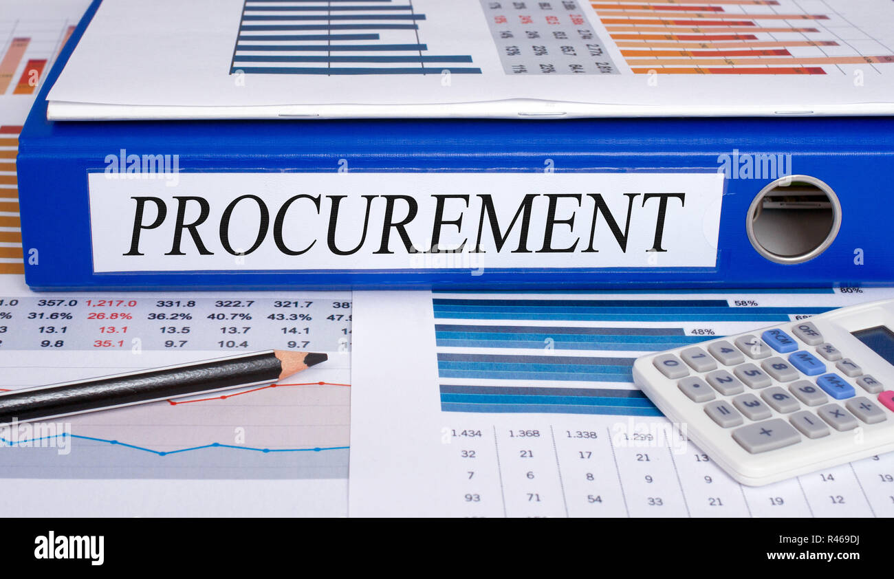 Procurement - blue binder in the office Stock Photo - Alamy