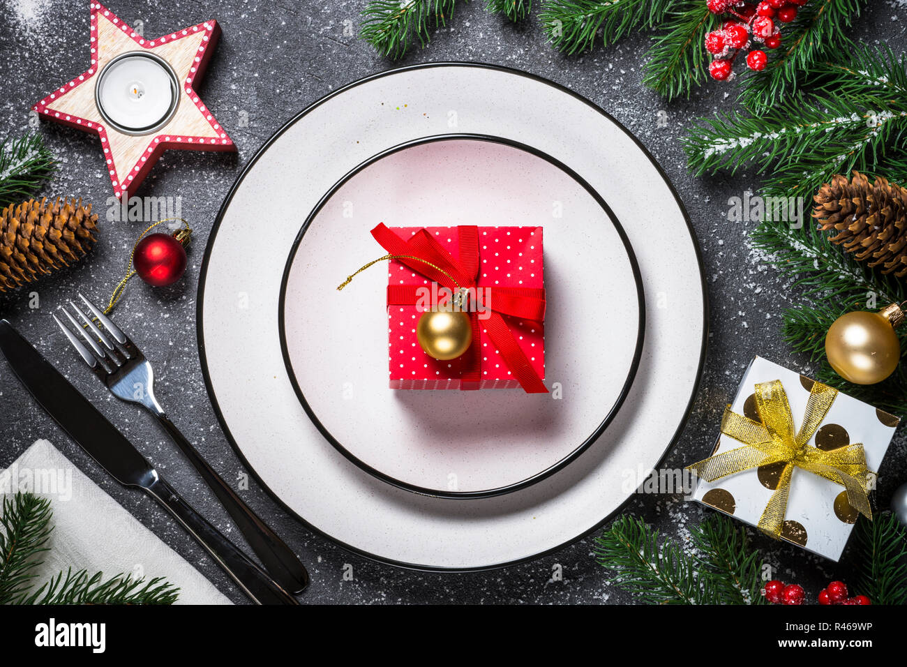 Christmas table setting - plate, cutlery and christmas decoratio Stock ...