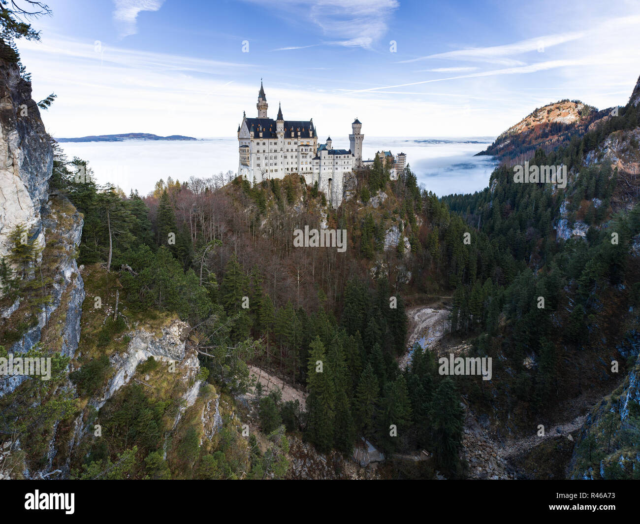 German Castle in autumn above sea of clouds Stock Photo - Alamy